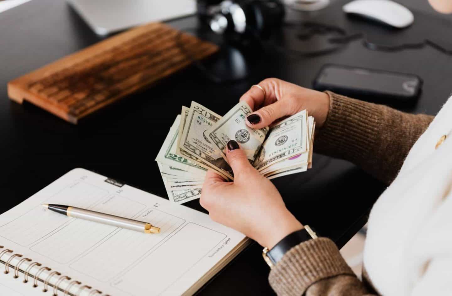 How to Live on Less Money: 42 Hacks to Thrive - Budgeting Couple