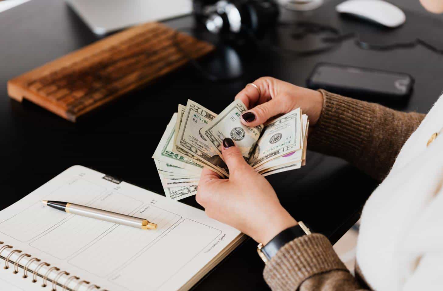 How to Live on Less Money: 42 Hacks to Thrive - Budgeting Couple