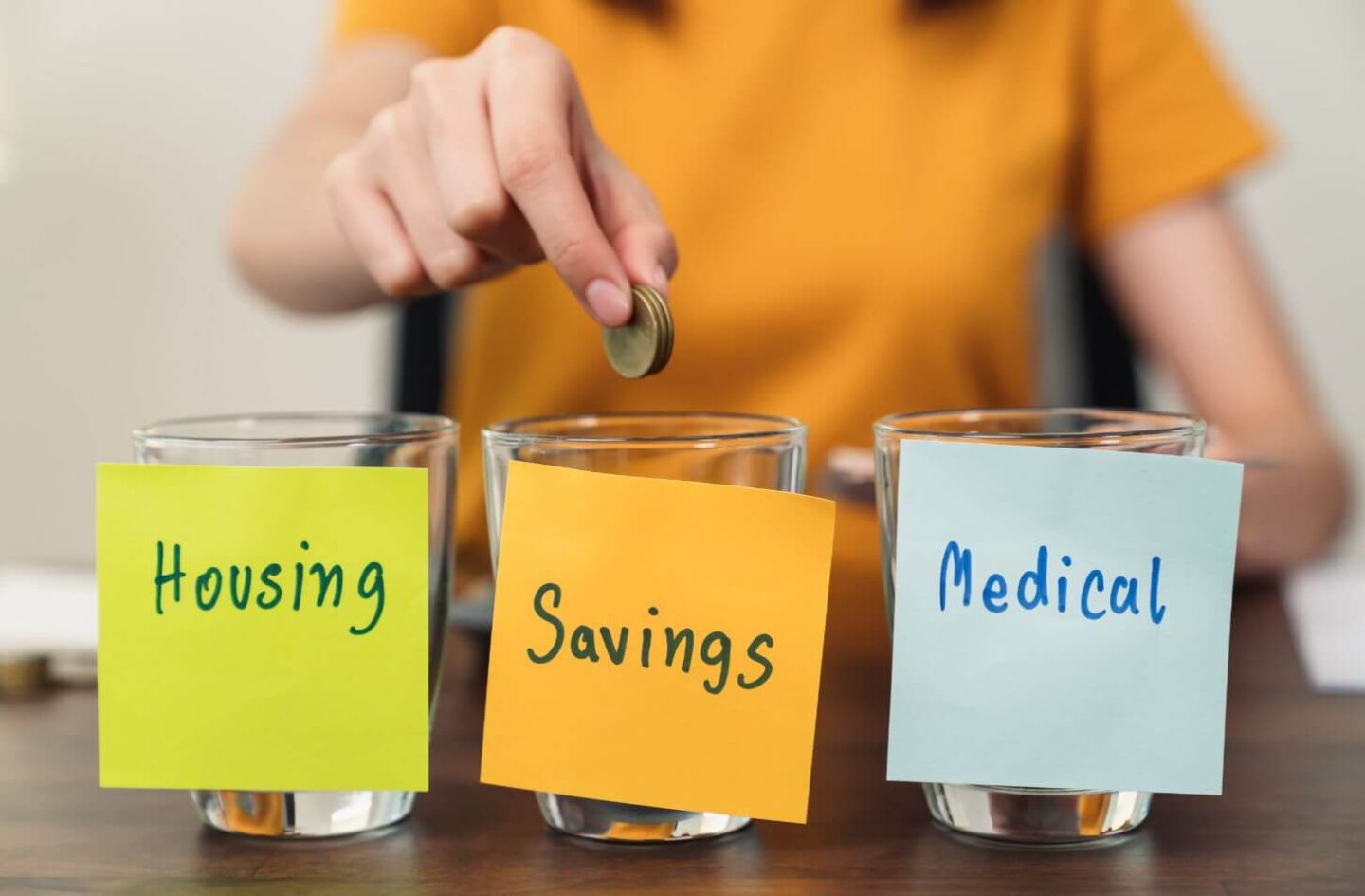 9 Warning Signs You’re Living Beyond Your Means - Budgeting Couple
